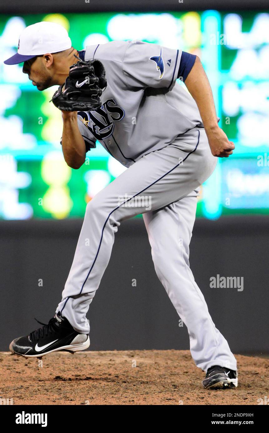 Tampa Bay Rays pitcher David Price ducks for a line drive over his head ...