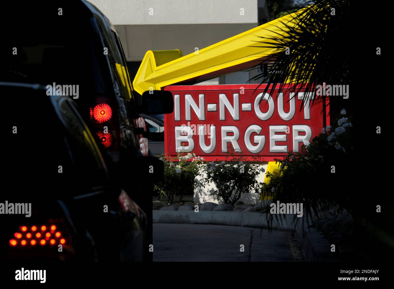 Cars line up in the drive-thru lane at In-N-Out Burger on Tuesday, June ...