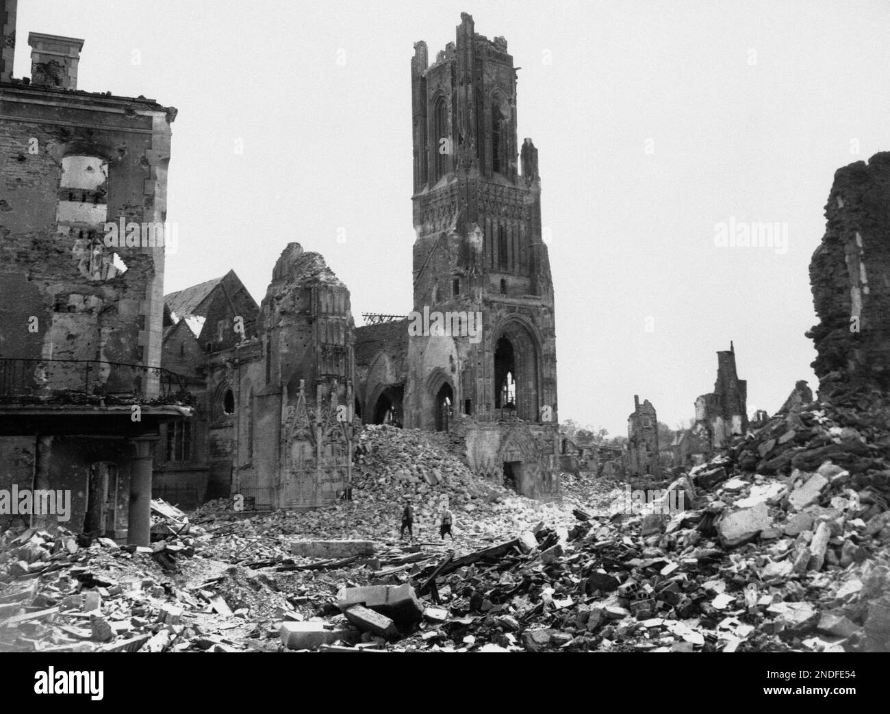 Among the wreckage of St. Lo, France, on July 31, 1944, now being ...