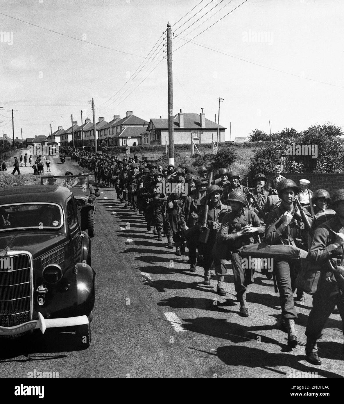 American march to a port of embarkation, somewhere in England, on June ...