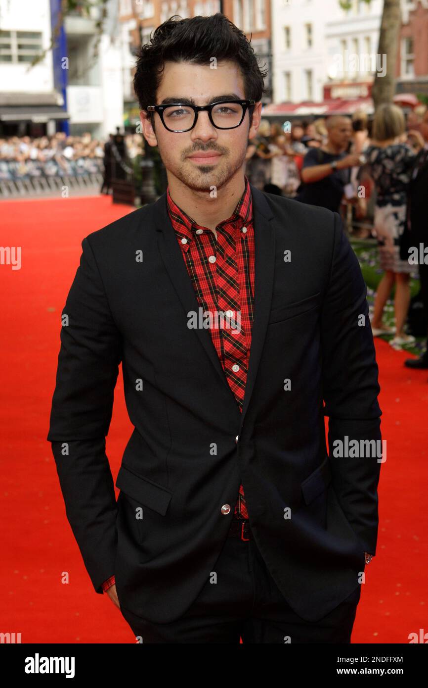U.S. musician Joe Jonas arrives on the red carpet for the British ...