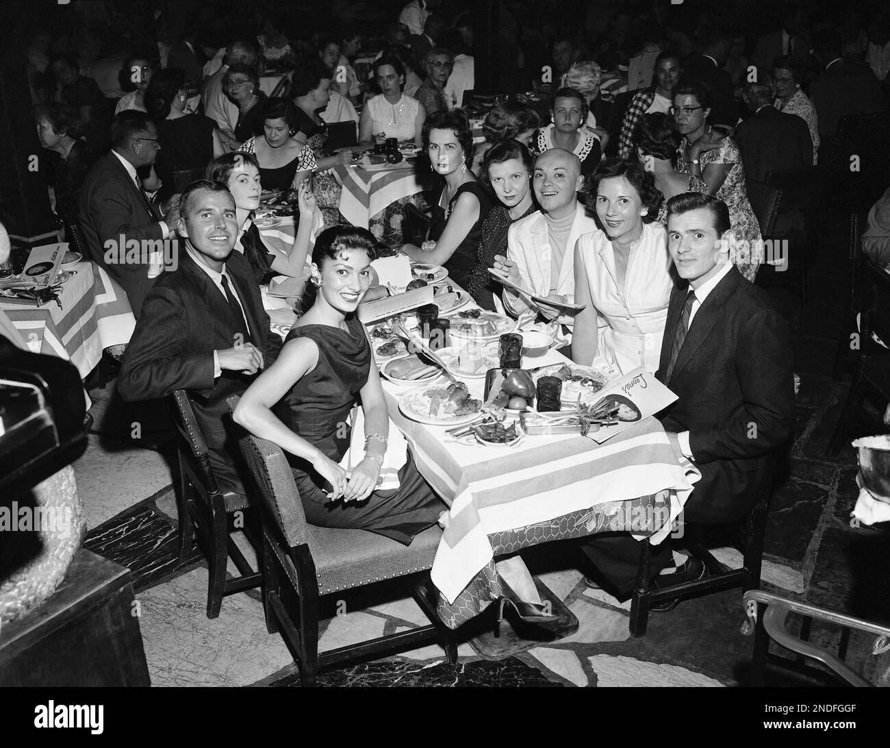 Members of the cast of the Broadway show "New Faces Of 1956" with two ...