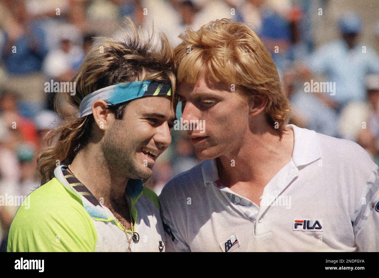 Fourth-seed Andre Agassi, left, and top-seeded Boris Becker speak at ...