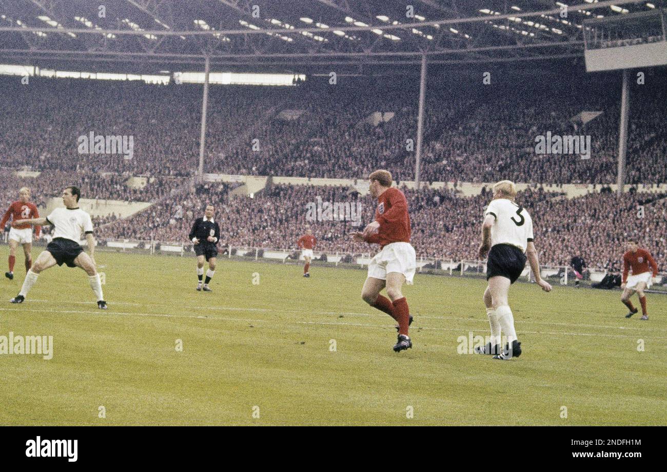 West German forward Franz Beckenbauer, referee Gottfried Dienst ...