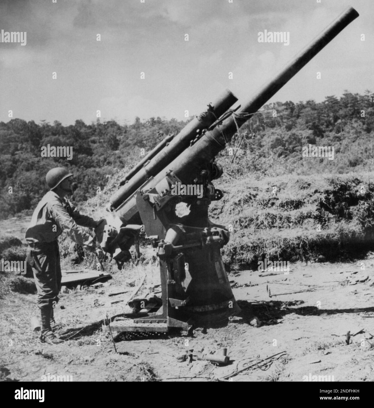 First Lieut. Arthur McGrath, of Boston, Mass., looks over a captured ...
