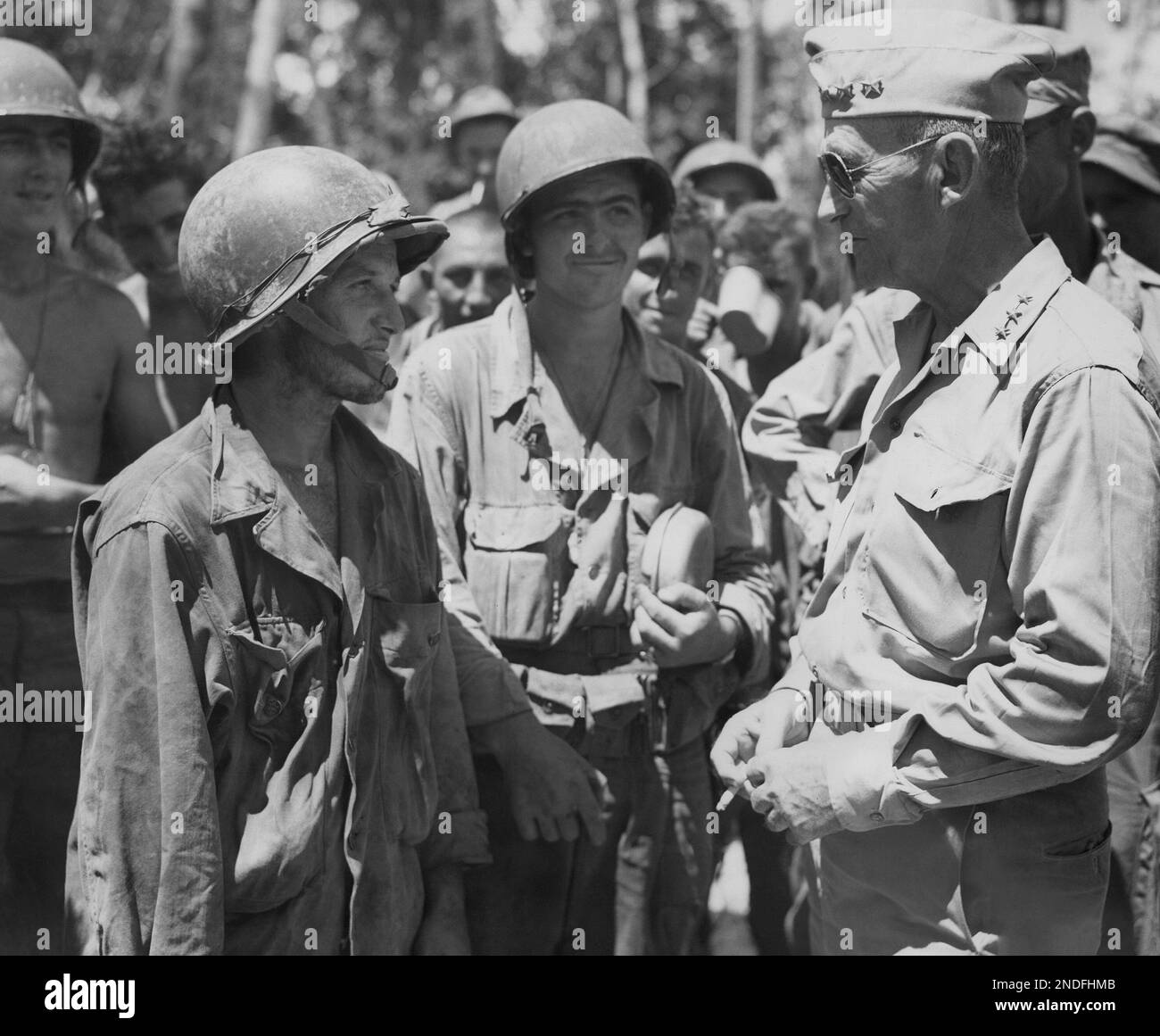 Lt. Gen. Walter Krueger (right), commander of the 6th Army, chats with ...