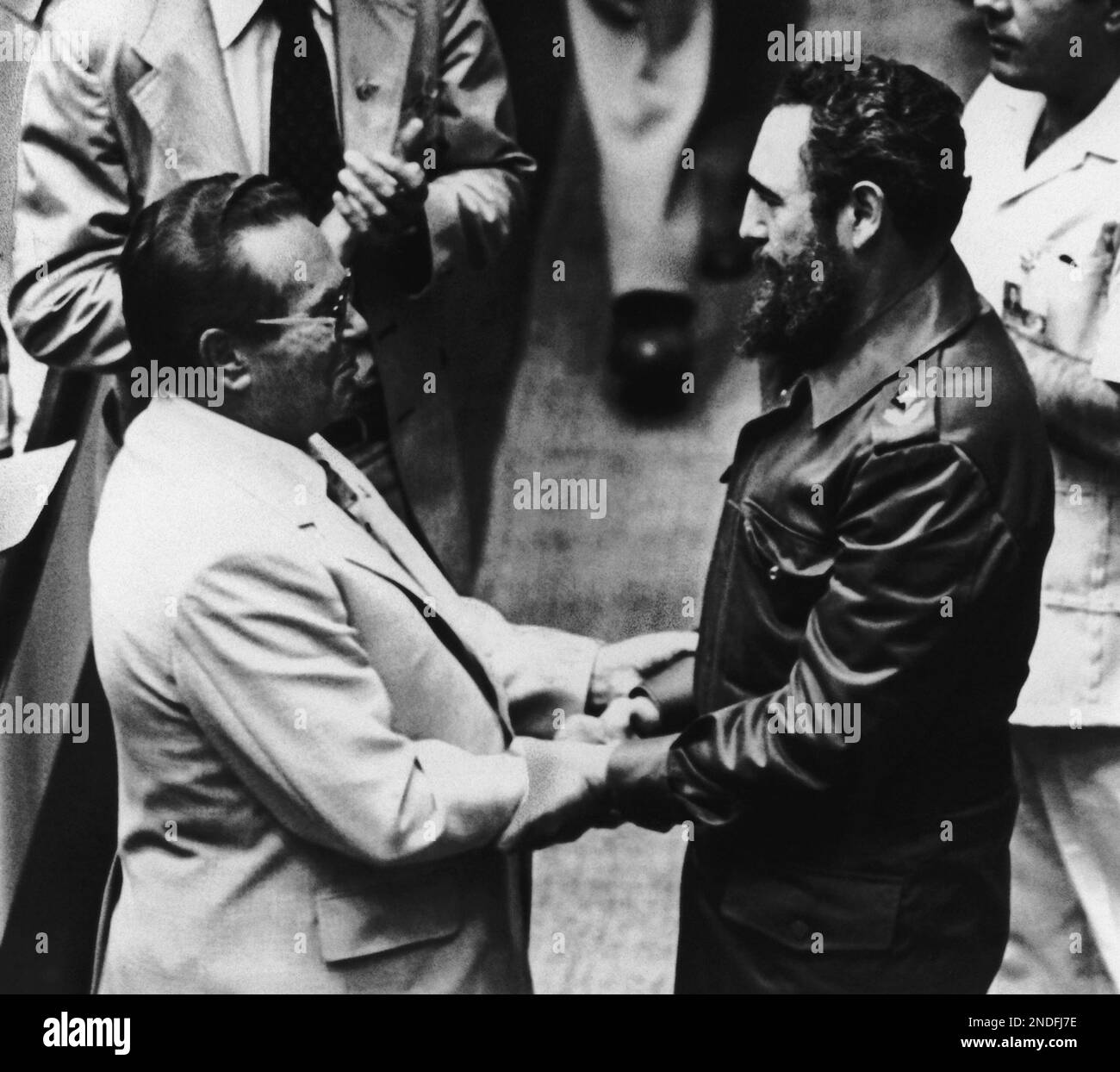 Yugoslav President Josip Broz Tito, left, shakes hands with Cuban ...