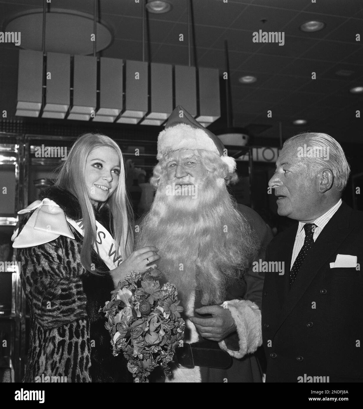 The new Miss World, Austria’s Eva Rueber-Staier, 20, helped by ...