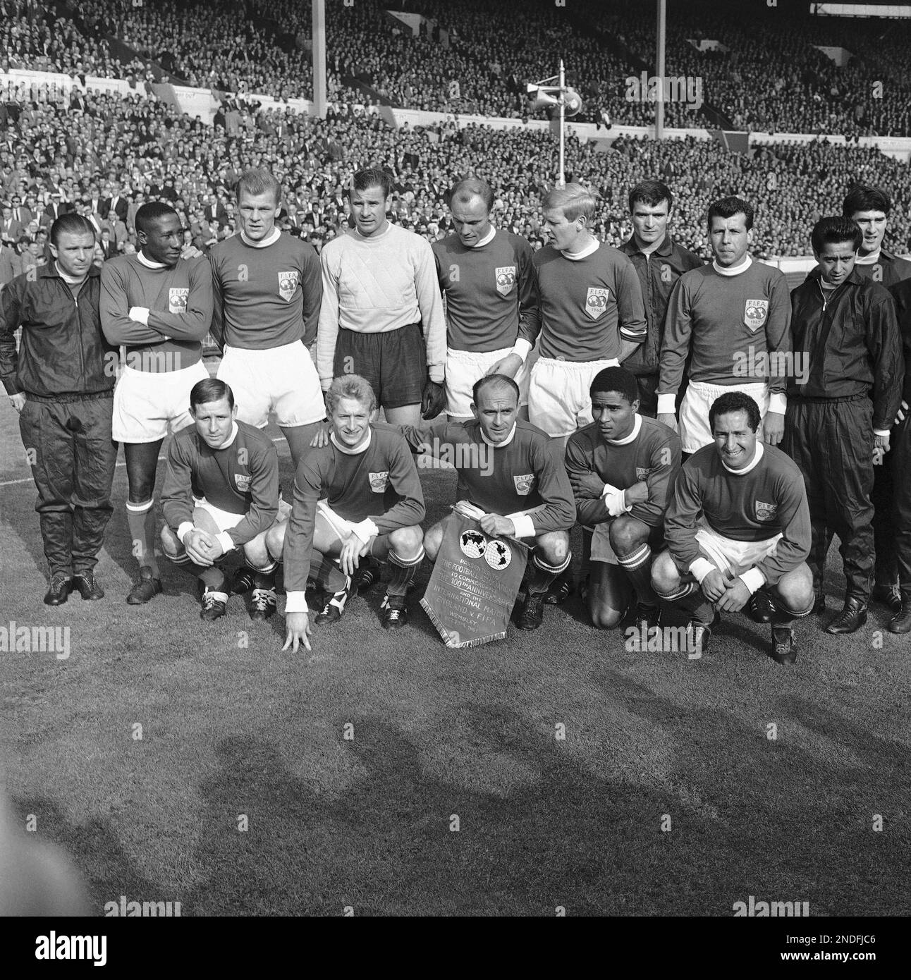 The "Rest of the world team" pictured at Wembley Stadium in London ...
