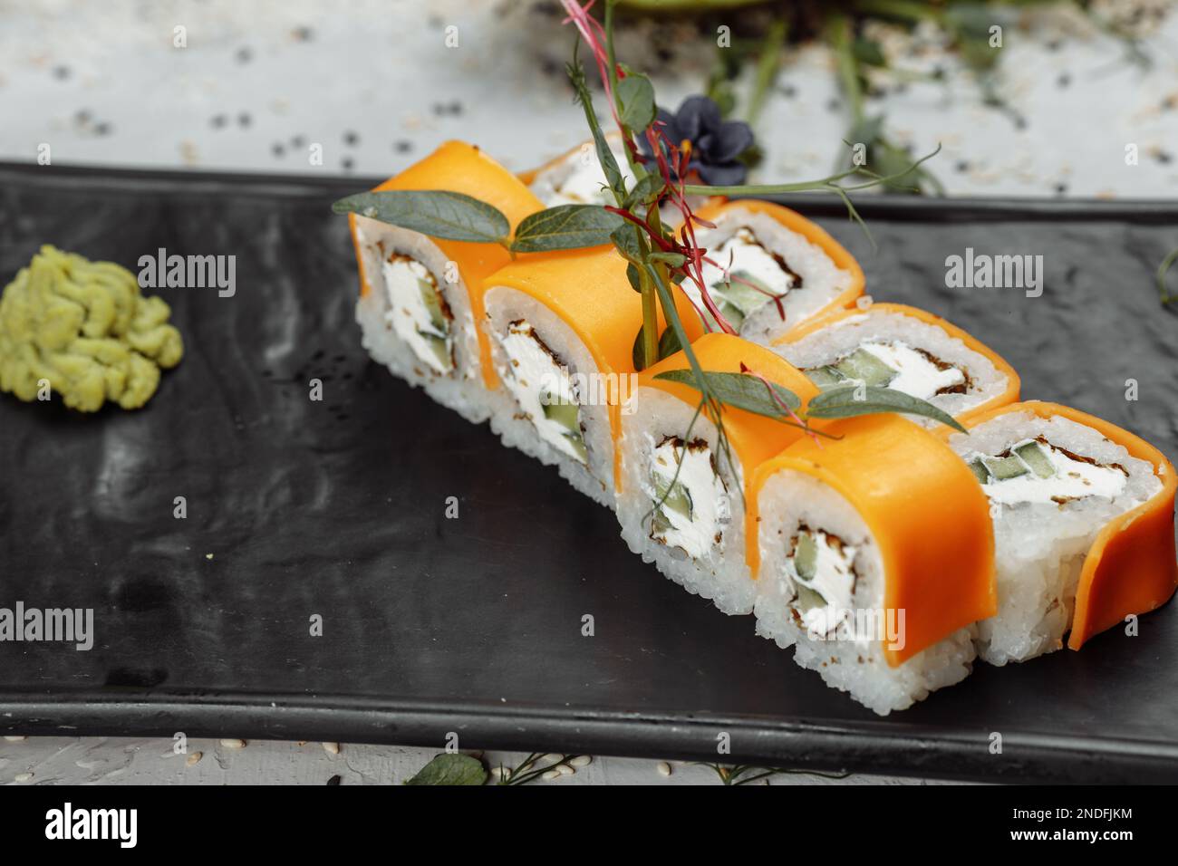 Rainbow Sushi Roll with salmon, eel, tuna, avocado, royal prawn, cream ...