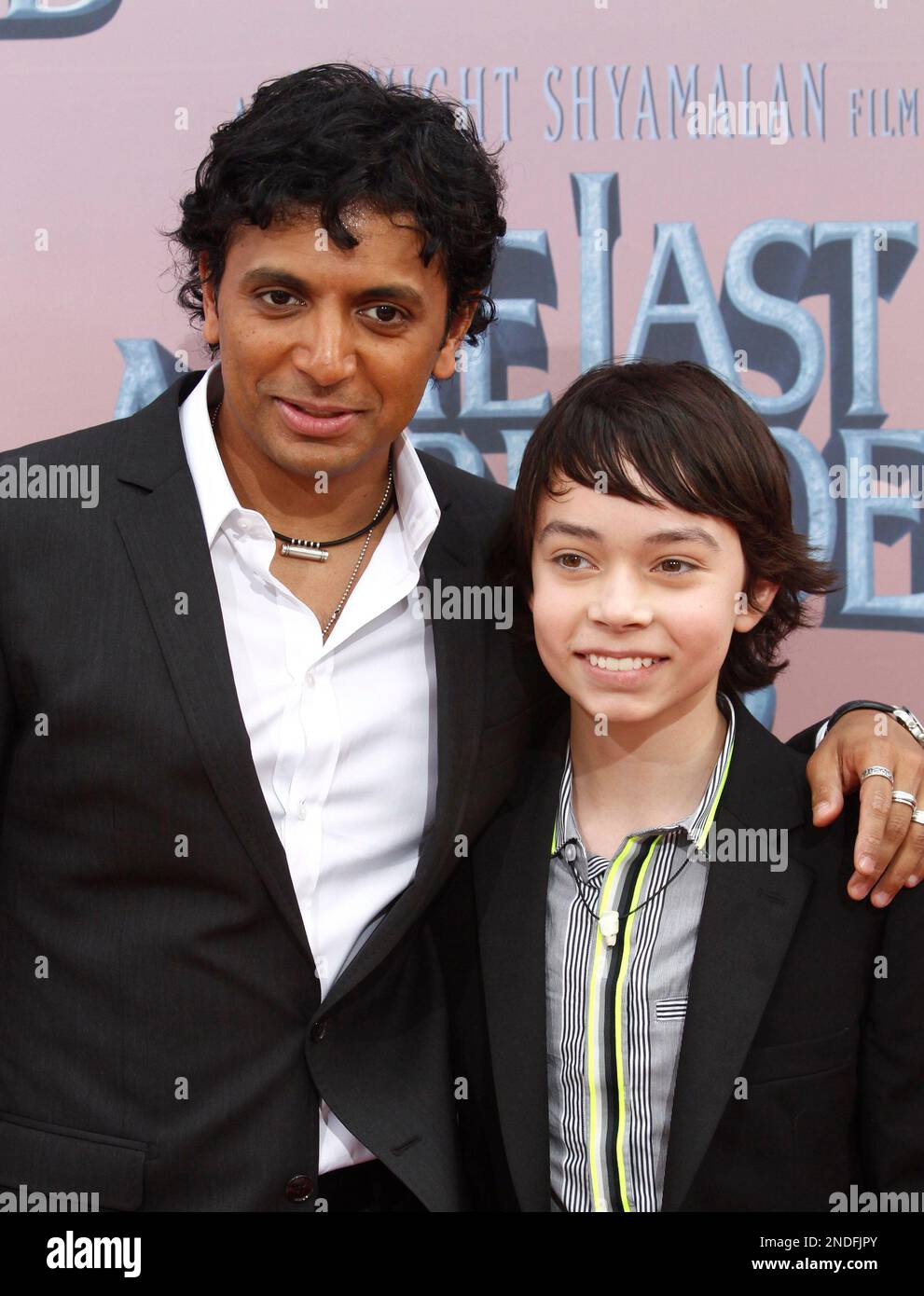 Director M. Night Shyamalan and actor Noah Ringer arrive to the ...