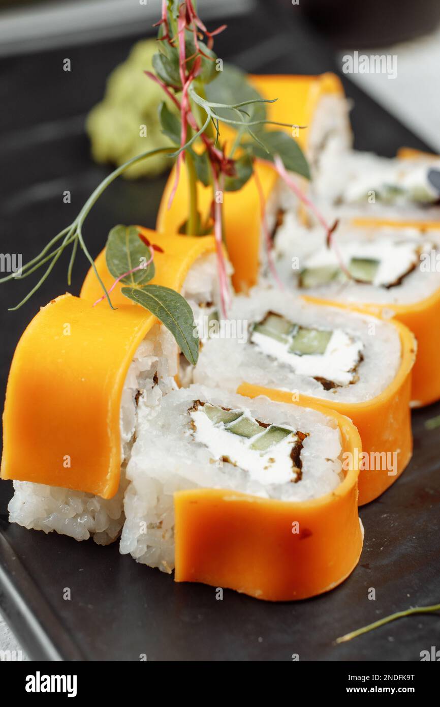 Rainbow Sushi Roll with salmon, eel, tuna, avocado, royal prawn, cream ...