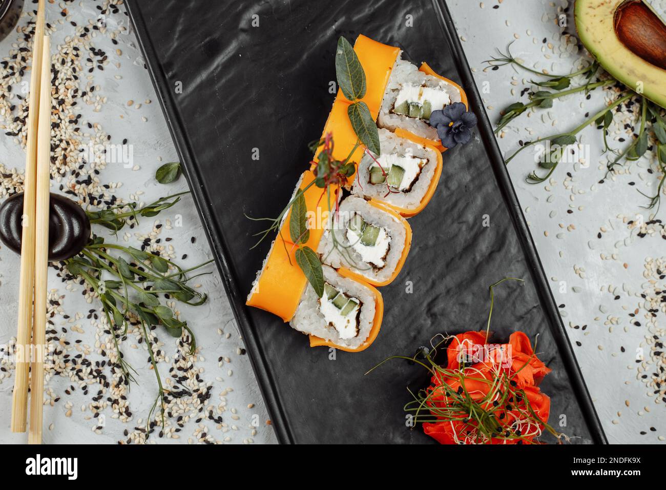 Rainbow Sushi Roll with salmon, eel, tuna, avocado, royal prawn, cream ...