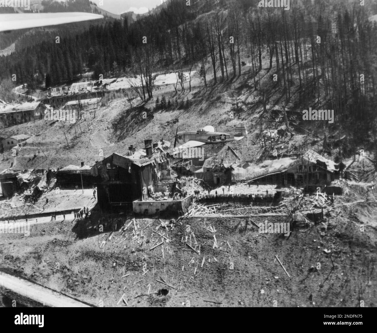 A P-47 Thunderbolt of the U.S. Army 12th Air Force flies low over the ...