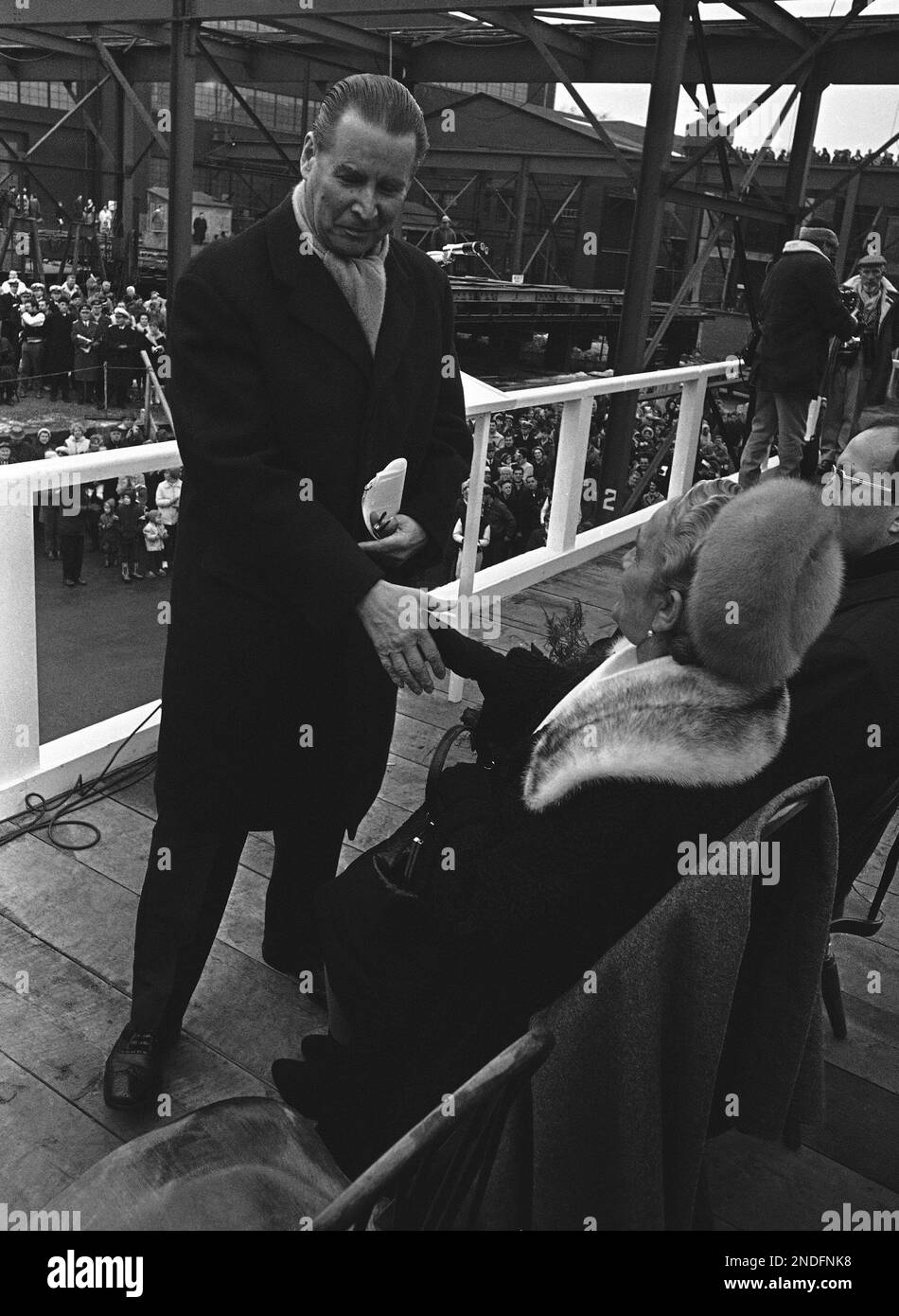 West German minister of defense Dr. Gerhard Schroder shakes hands with ...