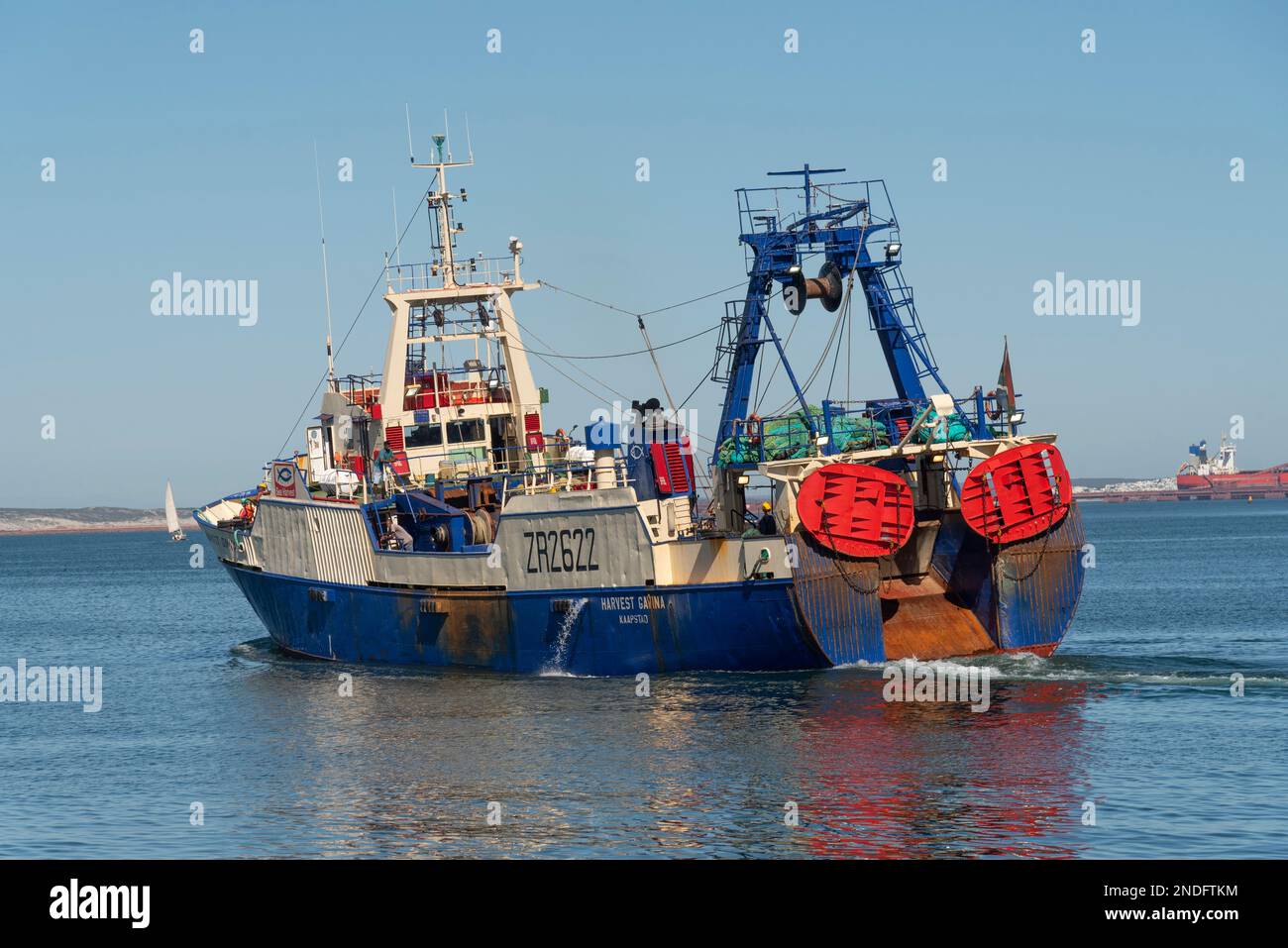 Saldanha Bay, west coast, South Africa. 2023. A fishing trawler leaving the port at Saldanha on ...