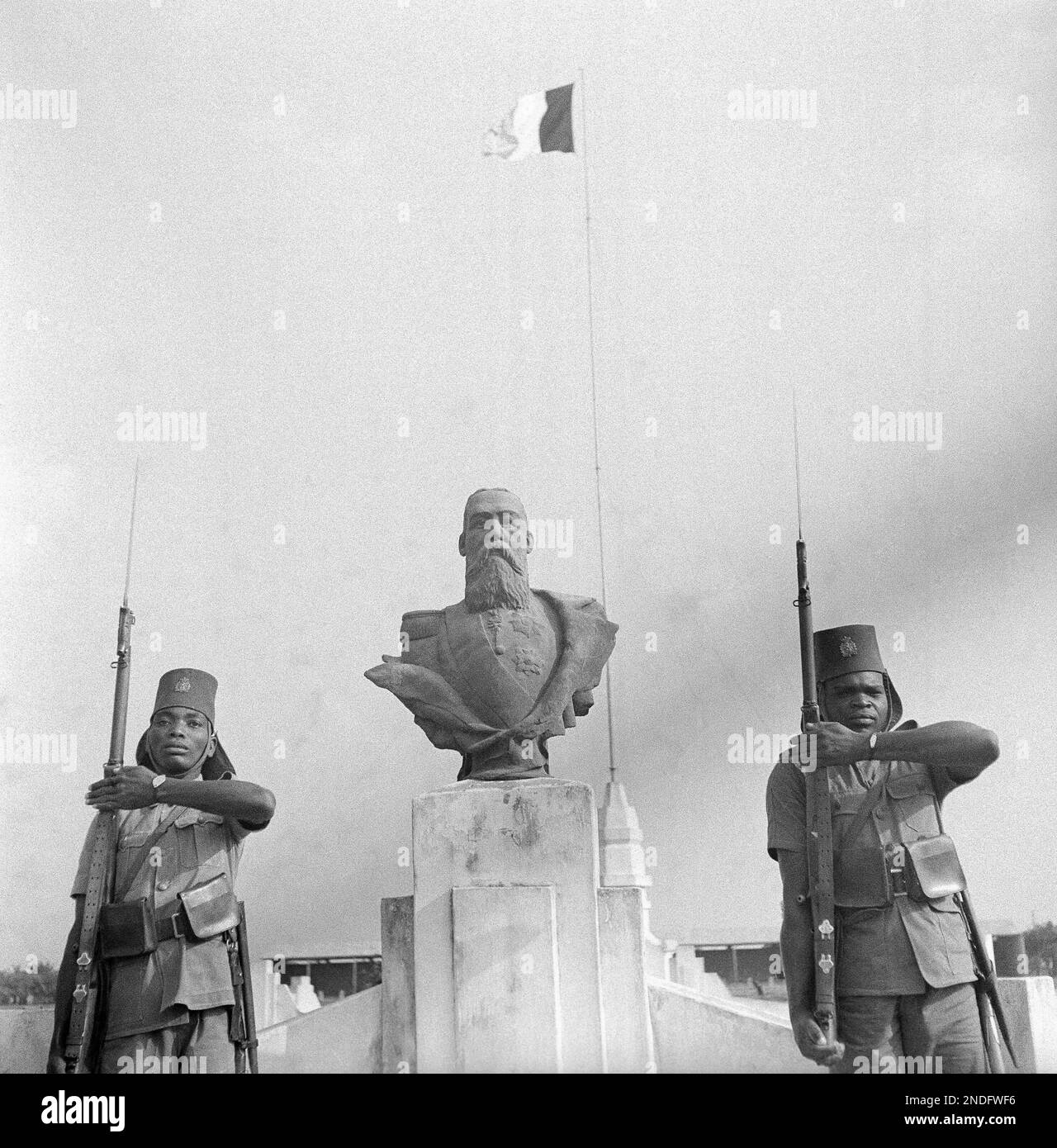 FILE - Belgian native troops guard a bust of King Leopold at entrance ...