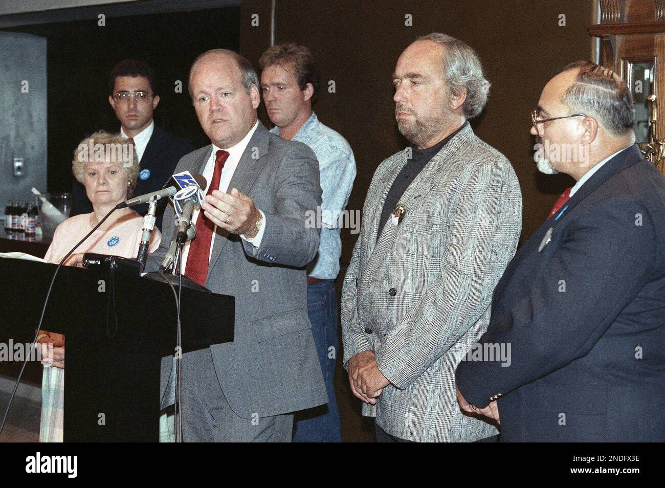 Bert Ammerman, at the podium, president of the group called "Victims of ...
