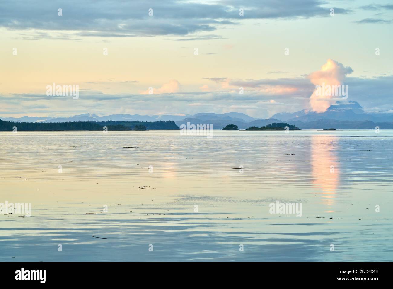 Johnstone Strait Islands Dusk Vancouver Island. Sunshine and clouds ...
