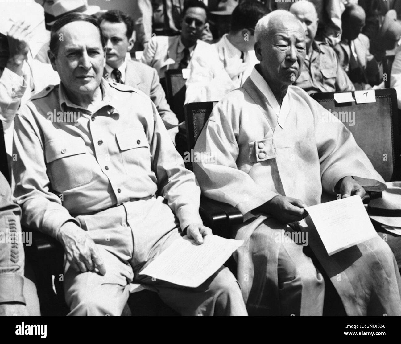 Syngman Rhee (right), first President of Korea, sits beside General ...