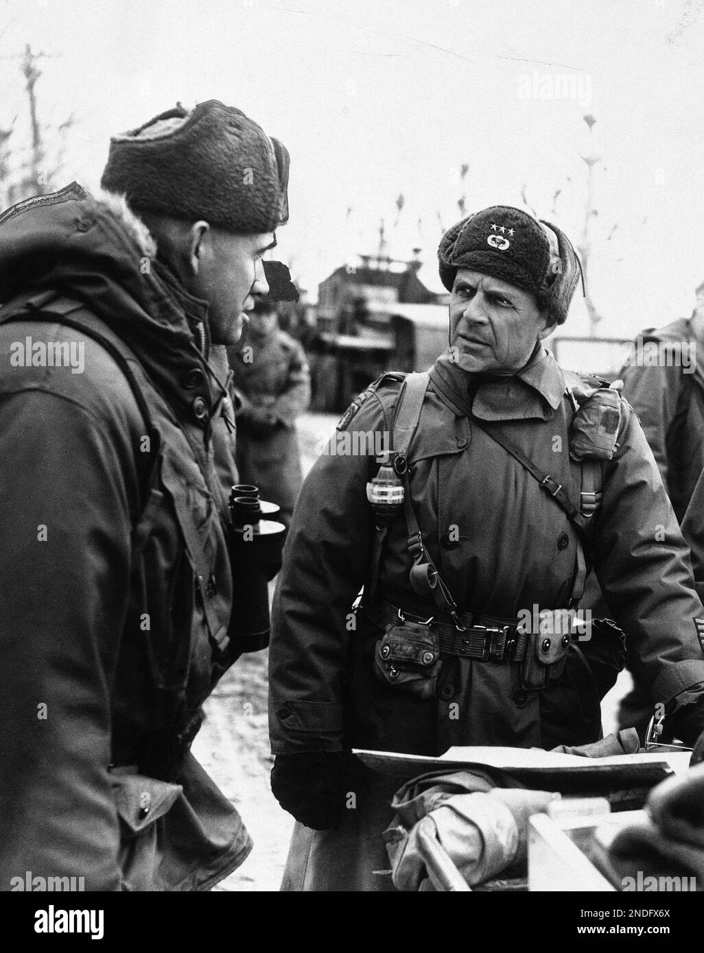 Lt. Gen. Matthew B. Ridgway, commanding general, 8th army, talks with ...
