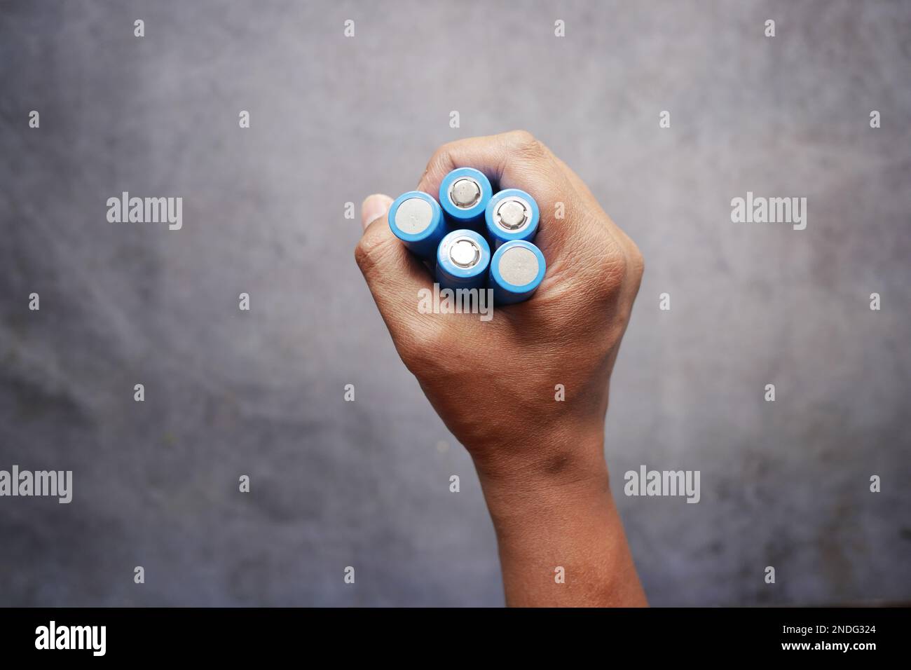 Close up holding batteries hi-res stock photography and images - Alamy