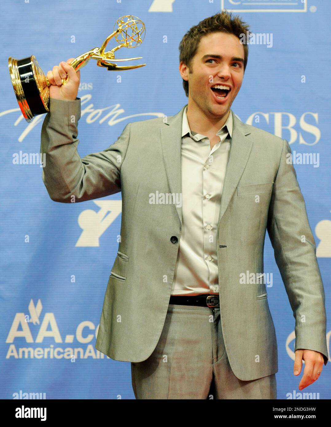 Drew Tyler Bell, a cast member in "The Bold and the Beautiful," poses with his Daytime Emmy for ...
