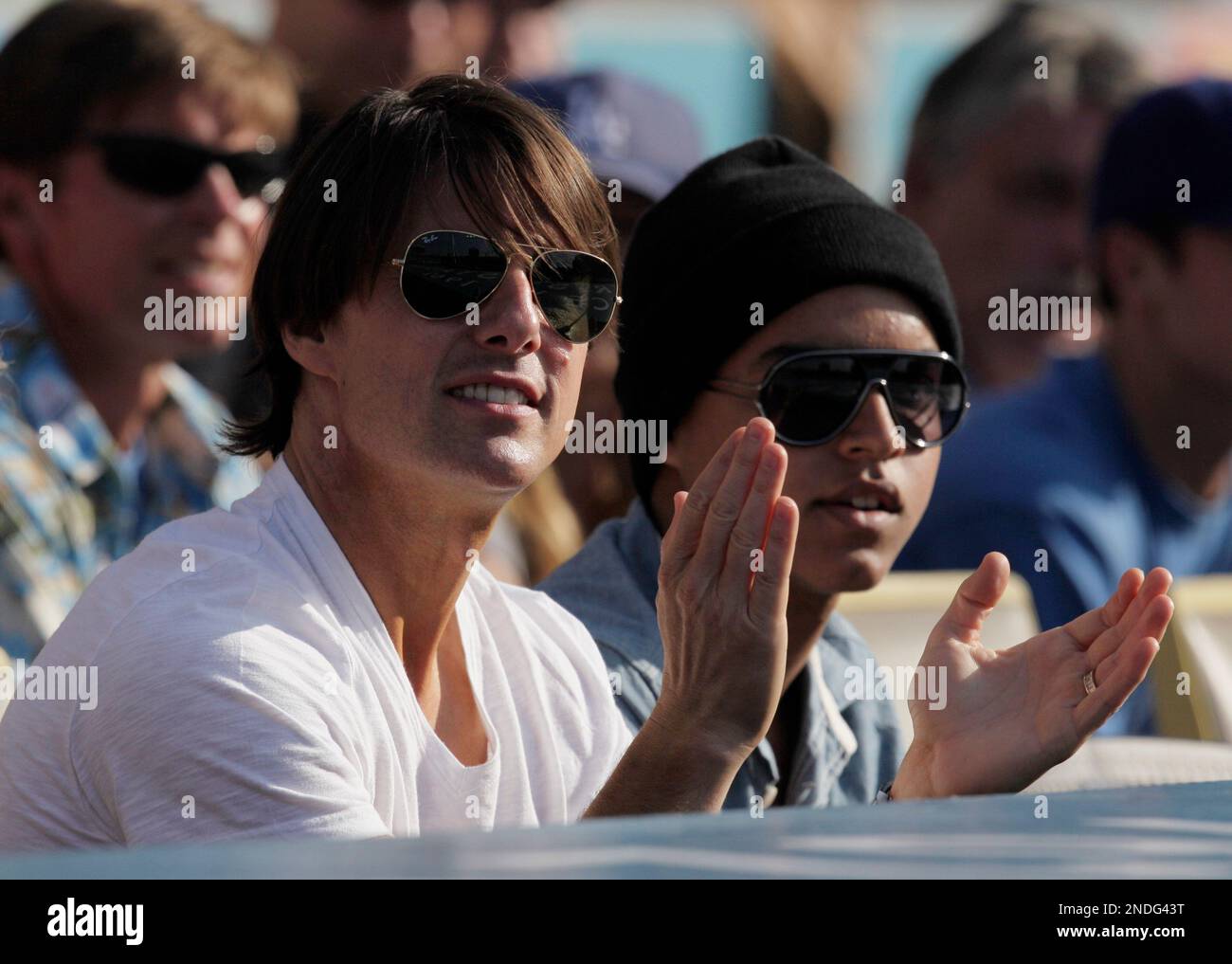 Actor Tom Cruise, left, and his son Connor Cruise watch a baseball game ...