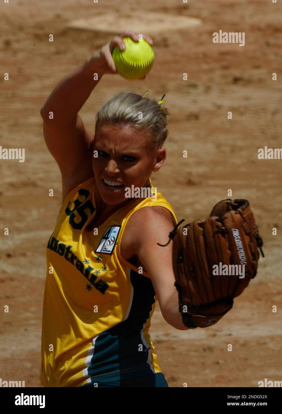 Australia's Karina Cannon pitches to the US at a Women's Softball World ...