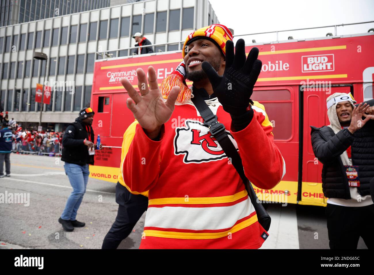 Kansas City Chiefs defensive end Carlos Dunlap dances as he walks in a ...