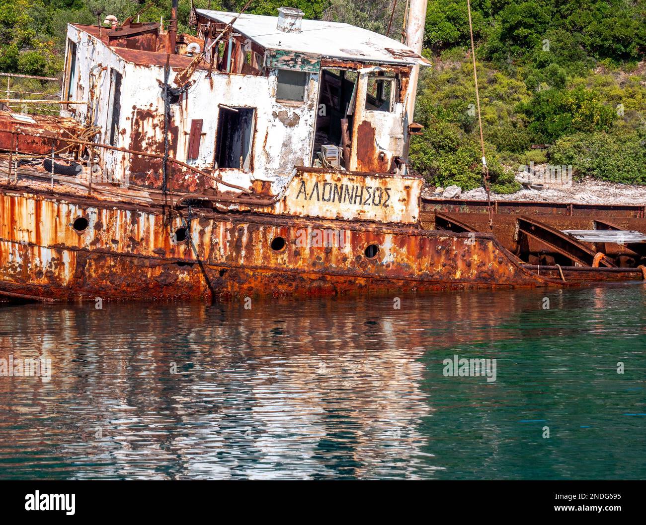 The rusty remains of ship on a shore Stock Photo - Alamy