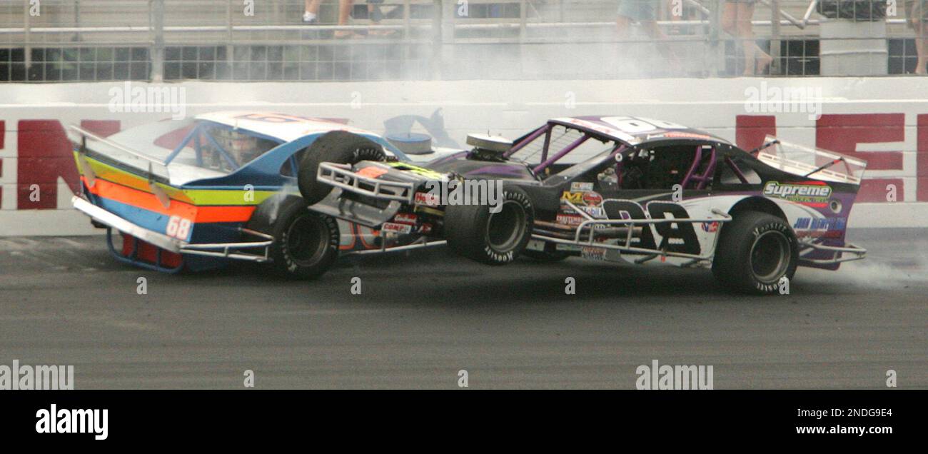 NASCAR Whelen Modified Tour driver Jamie Tomaino, right, hits Johnny ...