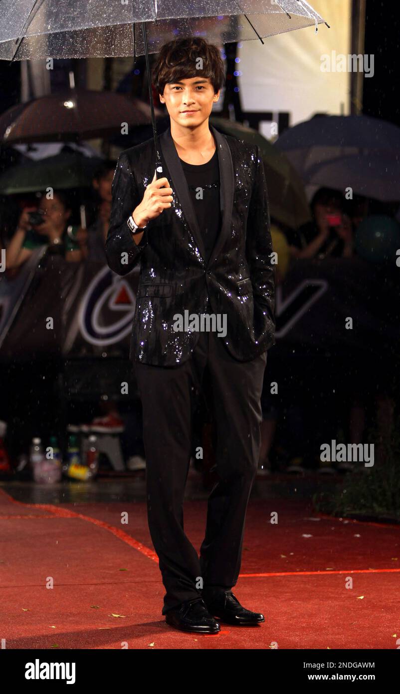 Taiwanese singer Joseph Cheng poses as he arrives at the 21st Golden ...