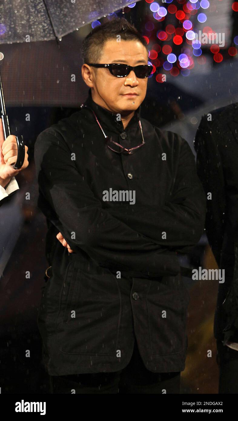 Taiwanese singer Ya-min Lee poses as he arrives for the 21st Golden ...