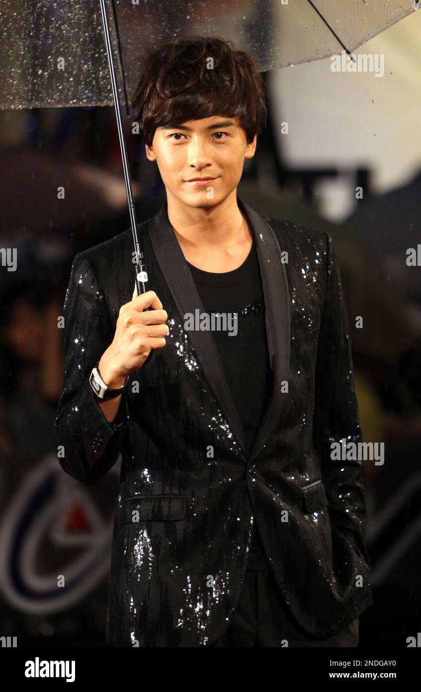 Taiwanese singer Joseph Cheng poses as he arrives at the 21st Golden ...