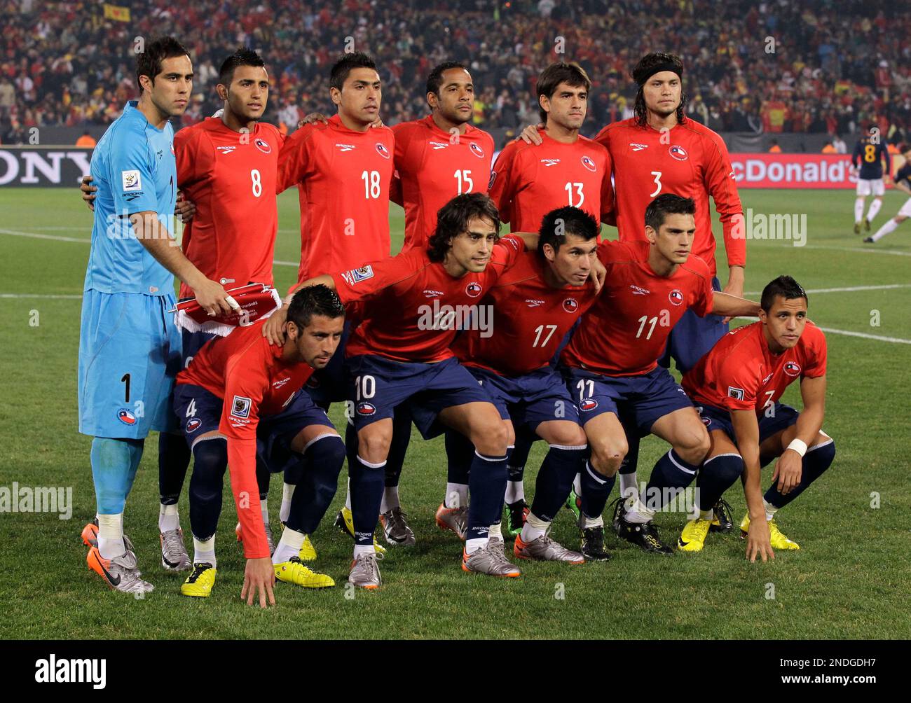 Members of Chile team pose for pictures during the World Cup group H soccer match between Chile ...