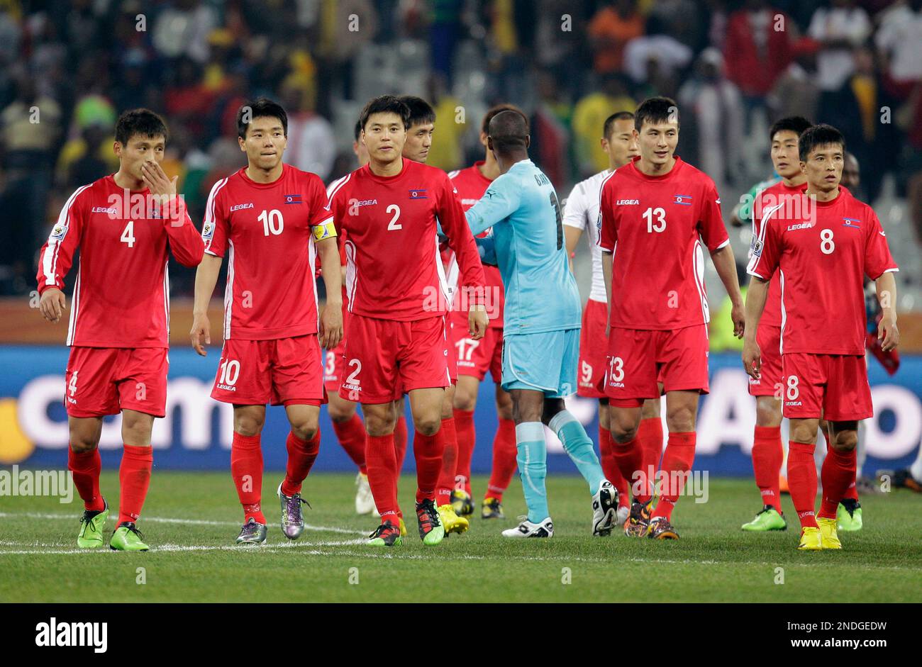 North Korea players leave the pitch after the World Cup group G soccer ...