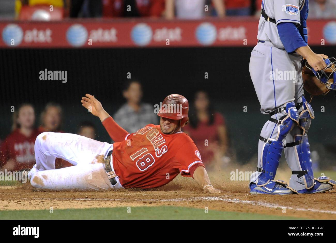 Los Angeles Angels' Kevin Frandsen slides into home to score off a ...