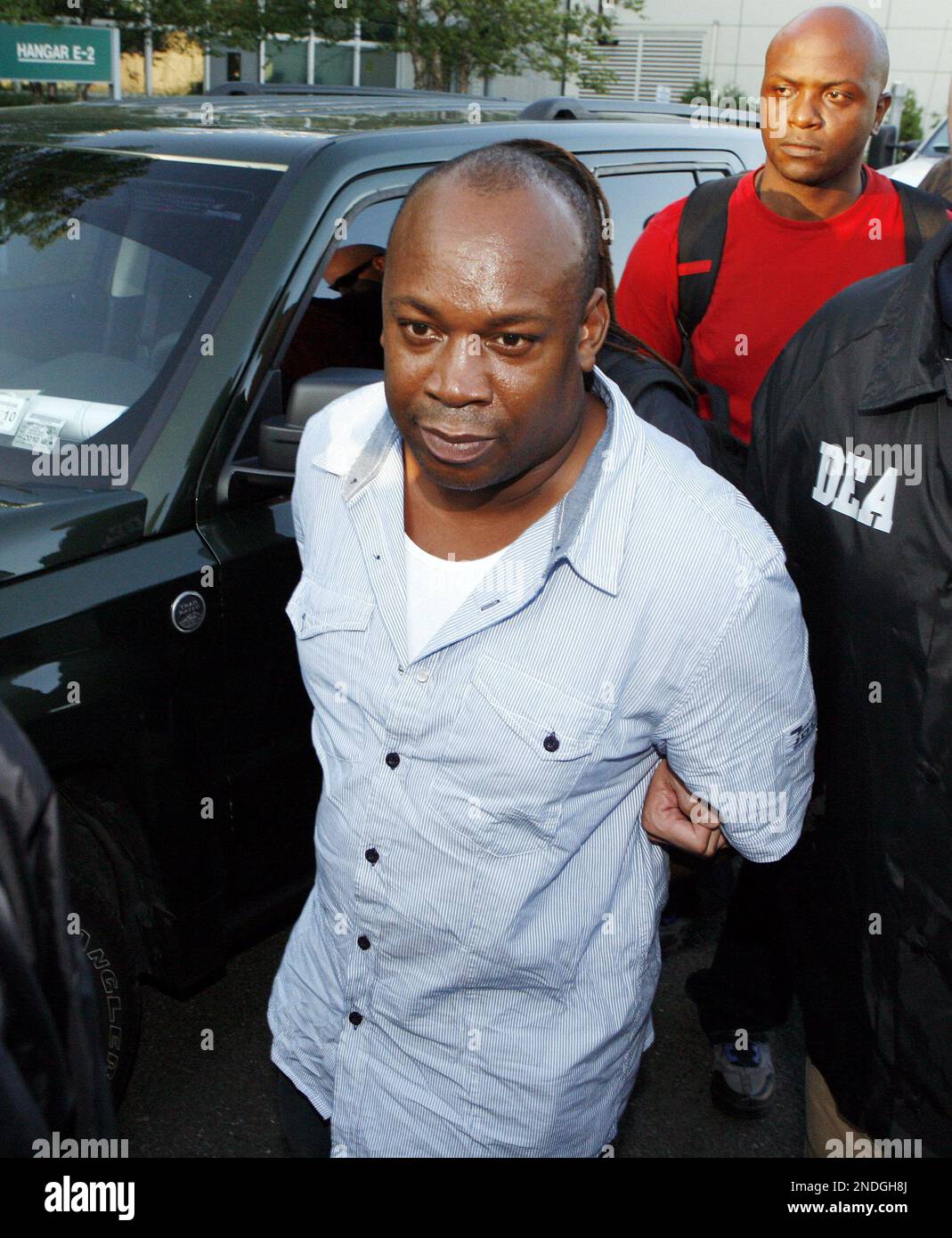 Christopher "Dudus" Coke, Jamaican gang leader escorted by DEA agents ...