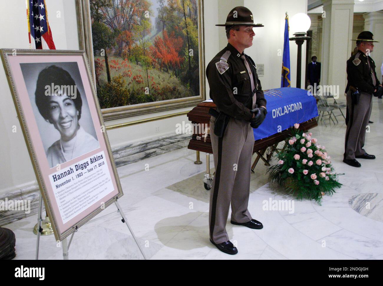 An Oklaholma Highway Patrol honor guard stands at the casket of Hannah ...