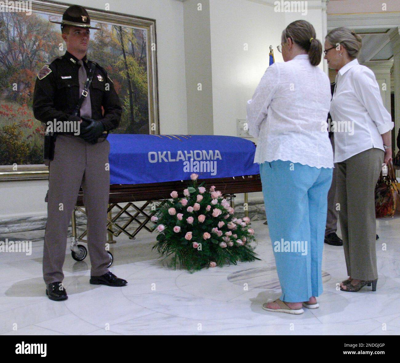 Two women stop at the casket of Hannah Atkins, the first black woman ...