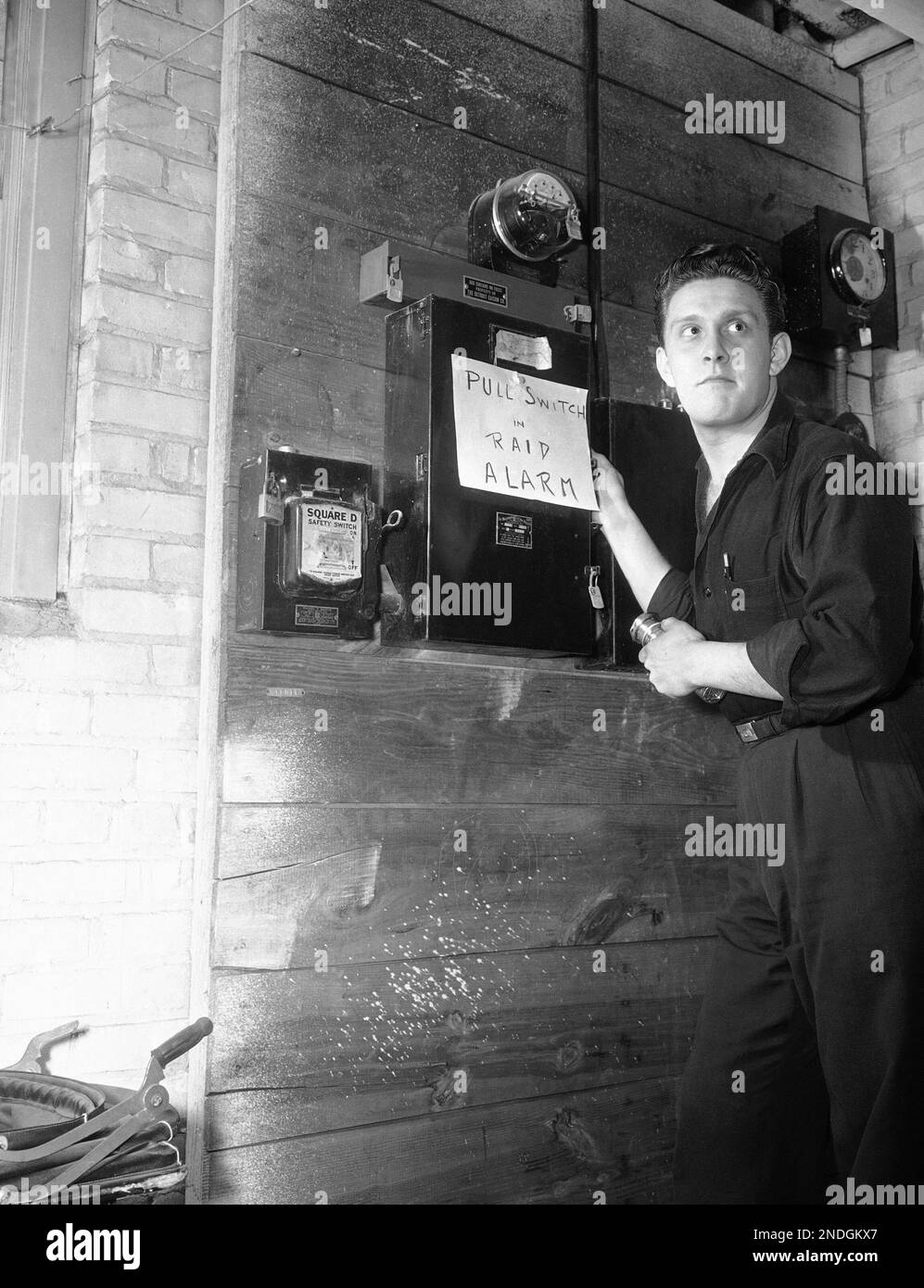 Richard Heim is ready at his job of turning off the electric current ...