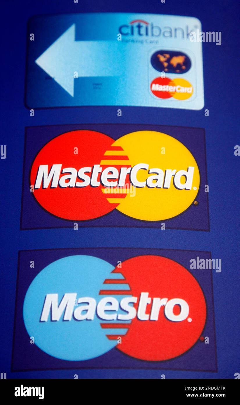 Signs for a Citibank banking card, top, a MasterCard credit card ...