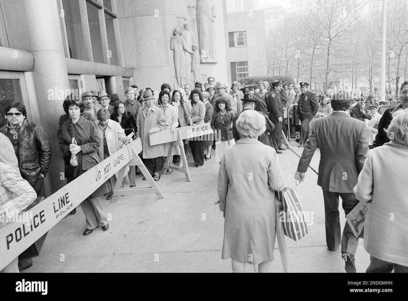 Spectators wait outside Brooklyn district courthouse in New York ...