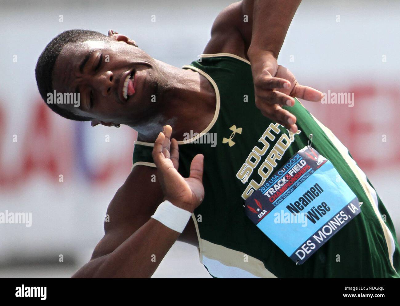 Neamen Wise, of South Florida, practices his shot put technique during ...