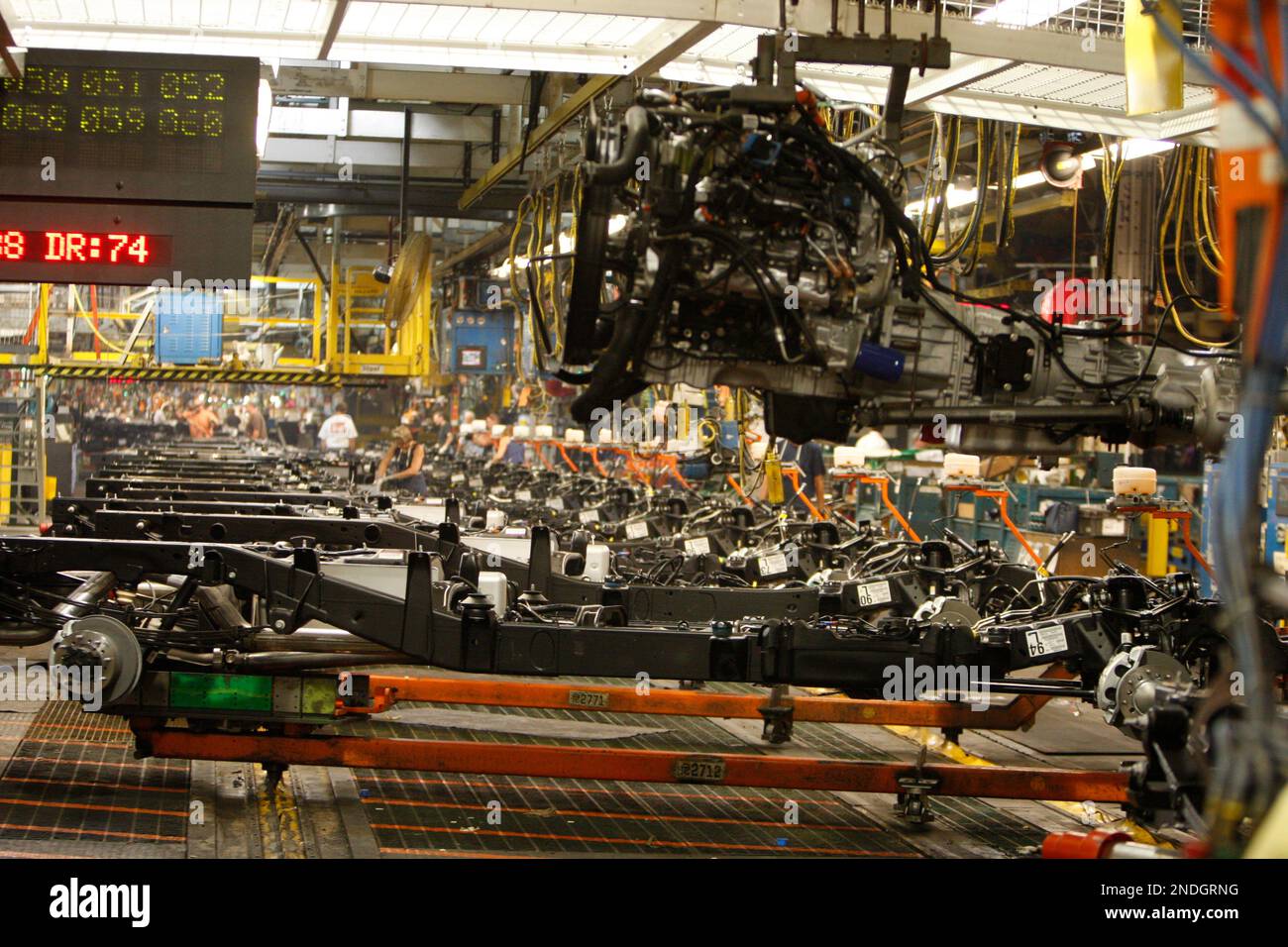 The 2011 GMC Sierra chassis is matched with an engine on the assembly ...