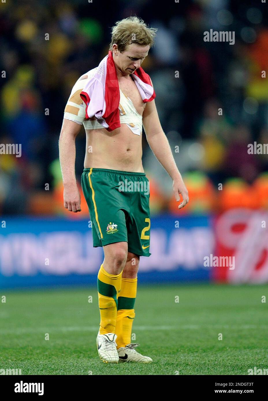 Australia's David Carney leaves the pitch at the end of the World Cup ...