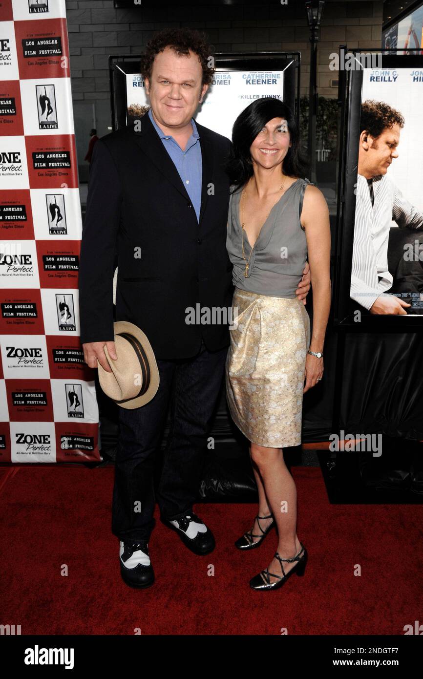 Actor John C. Reilly, left, and his wife, Alison Dickey arrive at the ...