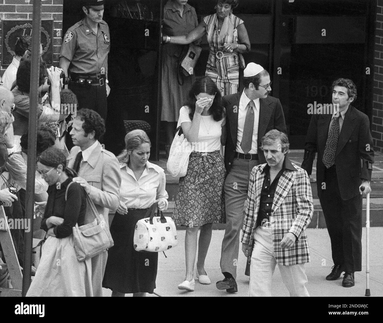 Friends leave a Brooklyn funeral home after hearing the last rites for ...