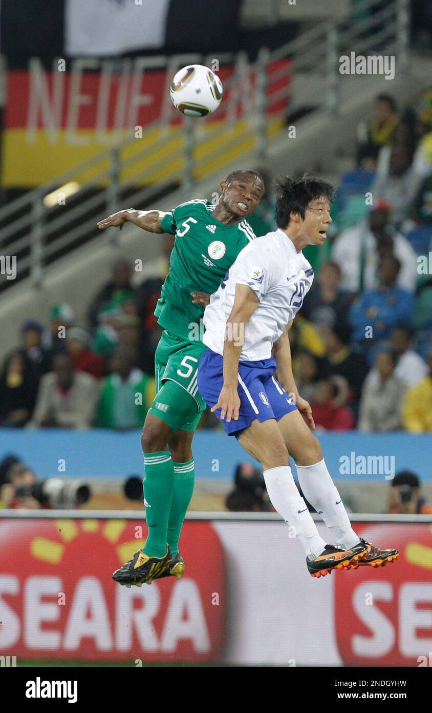 Nigeria's Rabiu Afolabi, left, and South Korea's Yeom Ki-hun during the ...